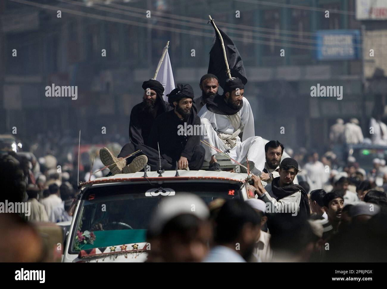 Pakistani Taliban gather during a rally addressed by their spiritual ...