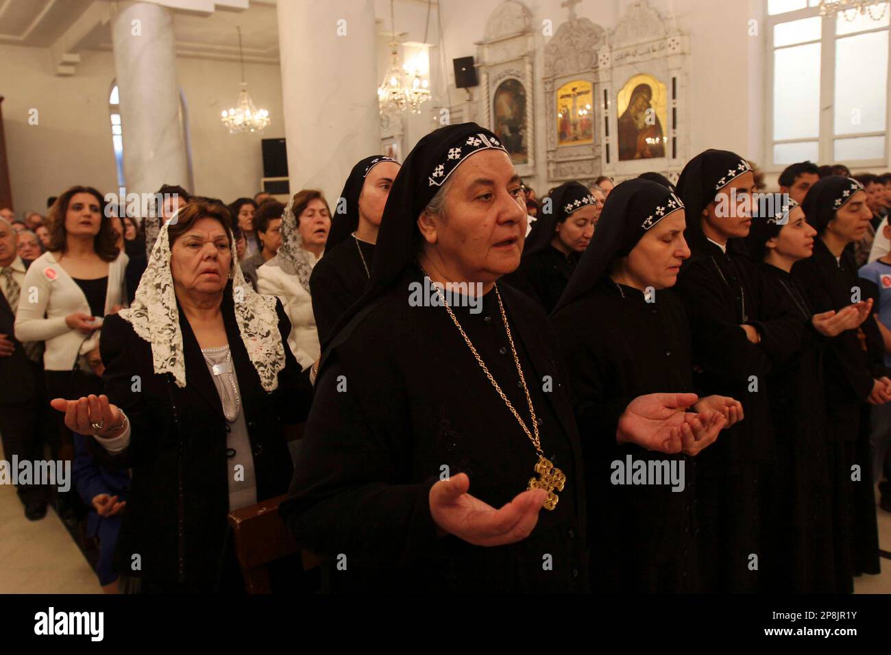 Orthodox faithful seen, during a mass held at the Syrian Orthodox ...
