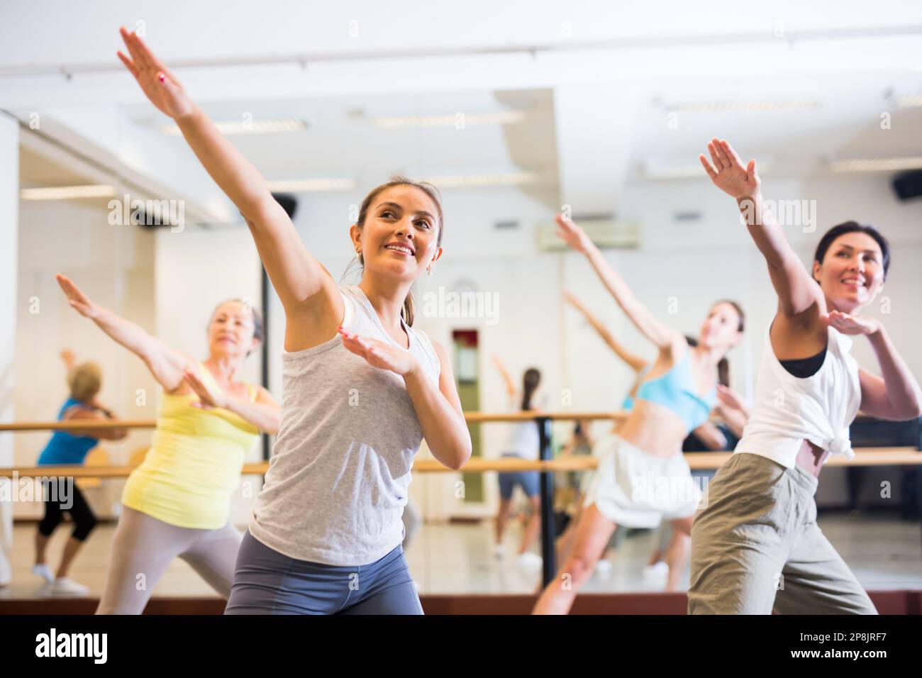 Various aged women dancing modern dance Stock Photo - Alamy
