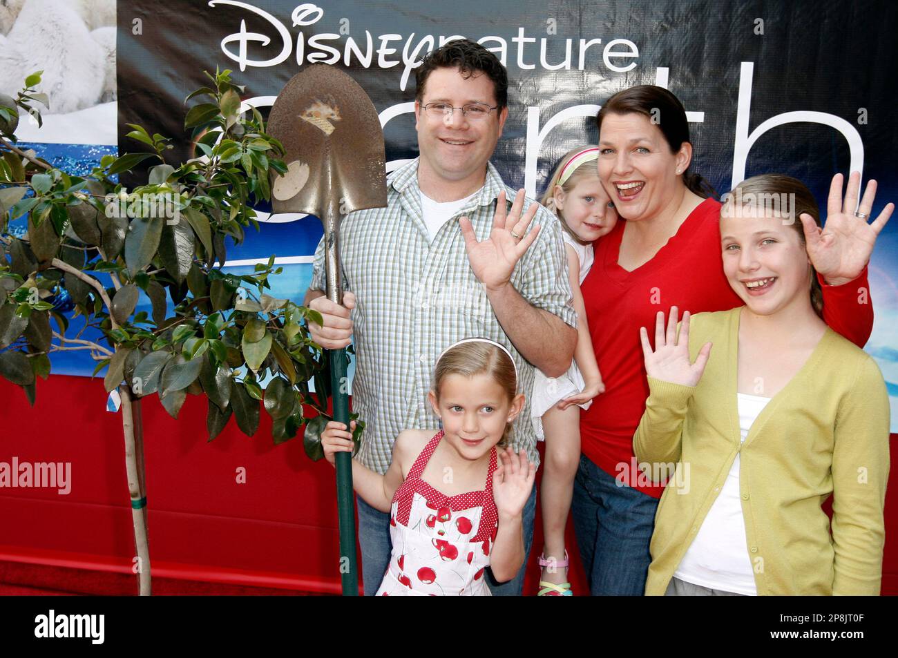 Actor Sean Astin, left, and his family pose for photographers at the ...