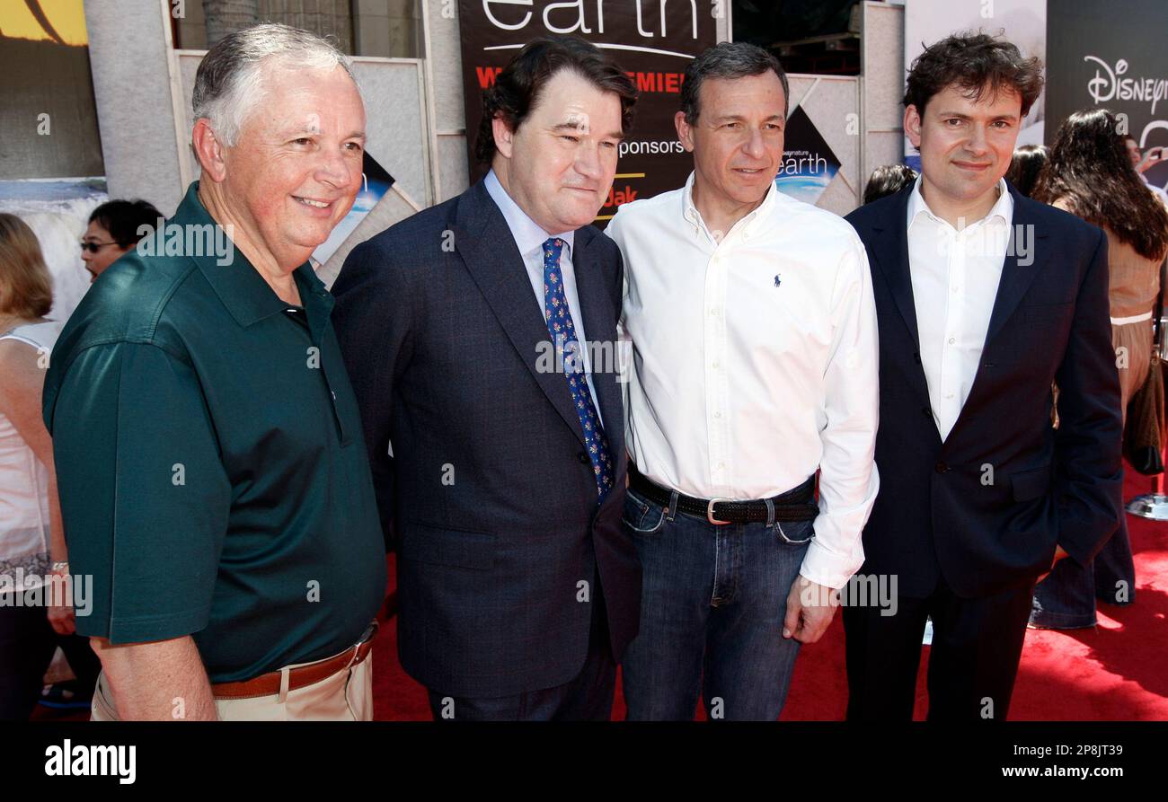 From left, Dick Cook, chairman of the Walt Disney Studios, director ...