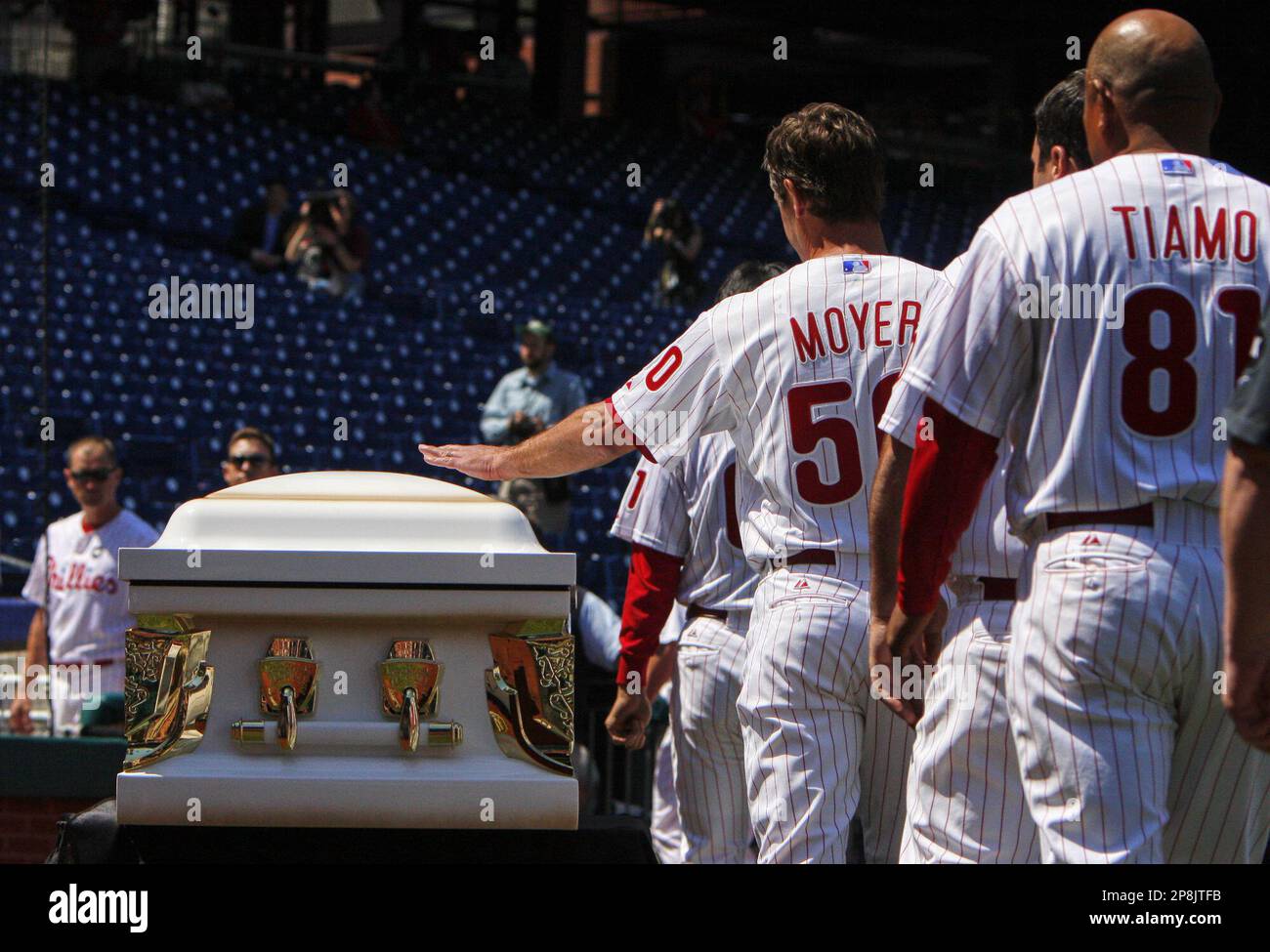 Jamie Moyer reaches out to touch the casket of Hall of Fame ...