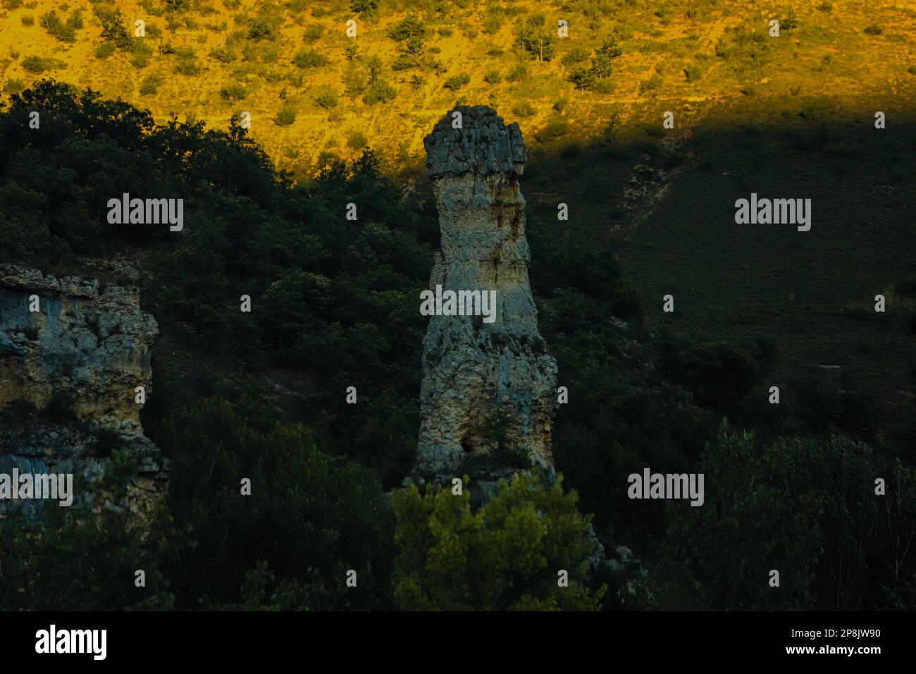 Elongated limestone rock formation in a mountain range Stock Photo - Alamy
