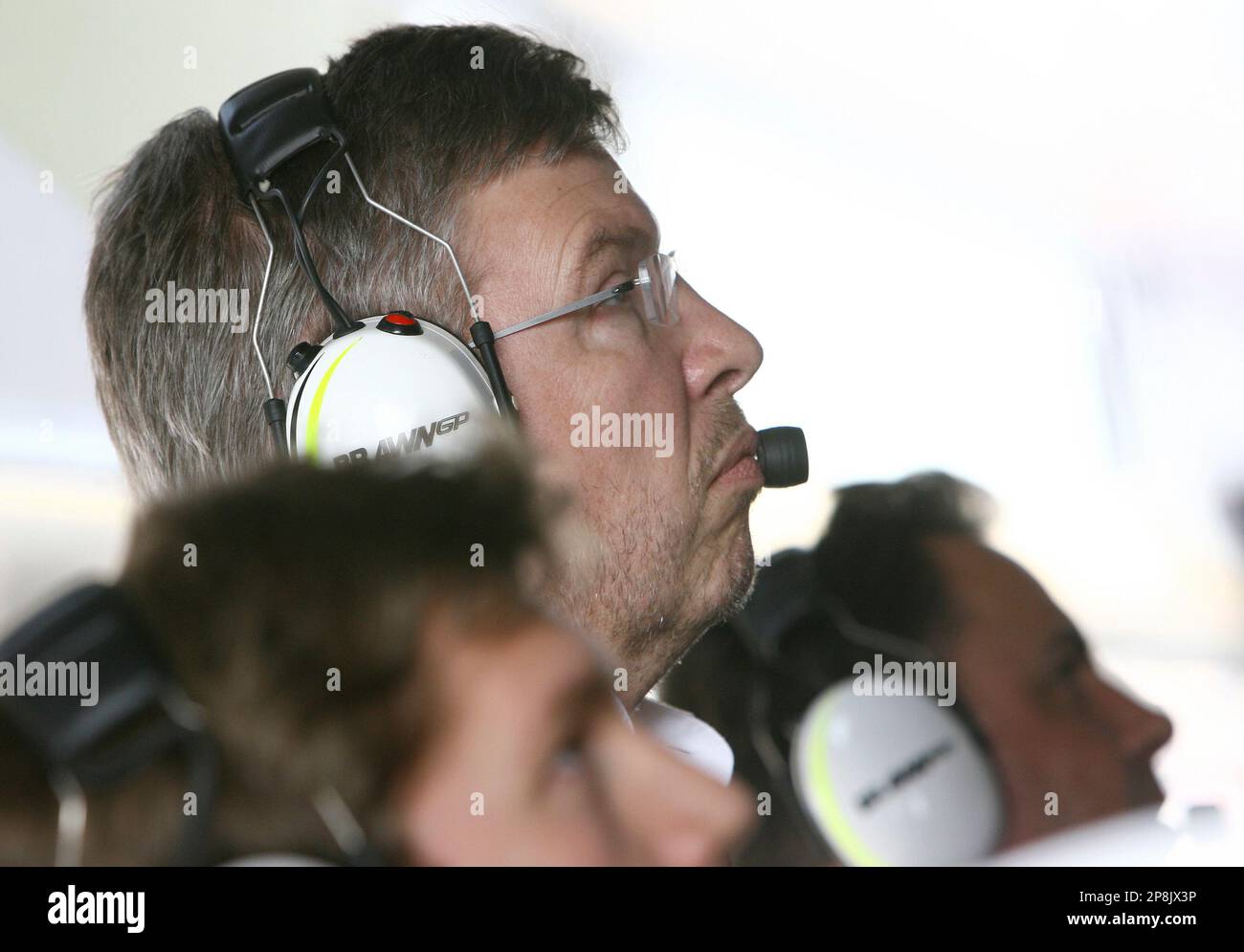 Brawn team principal Ross Brawn watches his drivers during qualifying ...