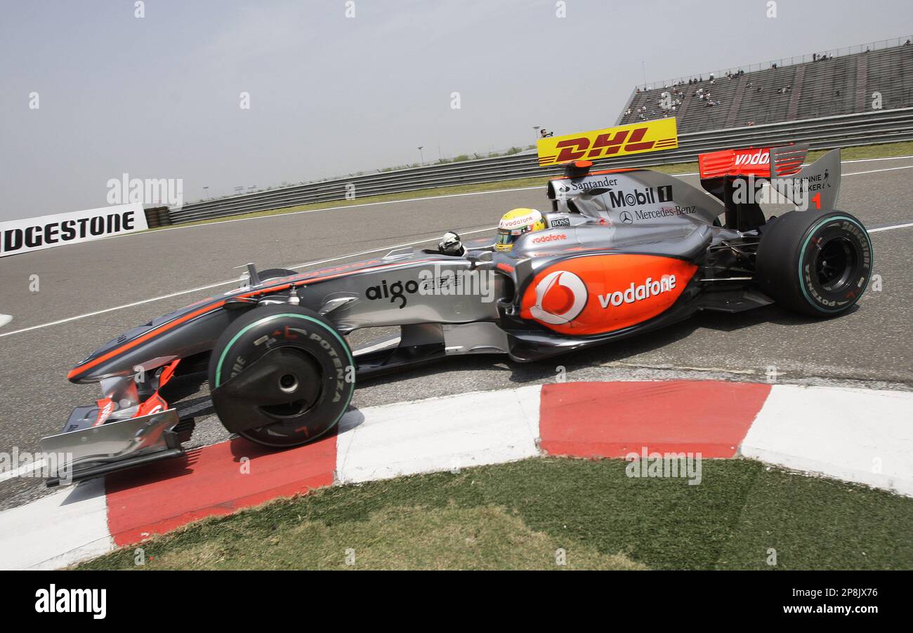 McLaren Mercedes Formula One driver Lewis Hamilton of Britain heads ...