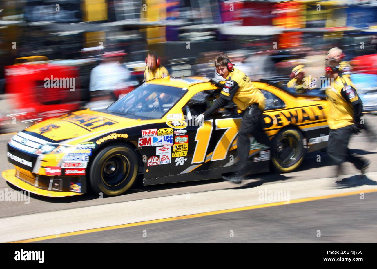 Matt Kenseth's crew pushes him into the garage at the end of a NASCAR ...
