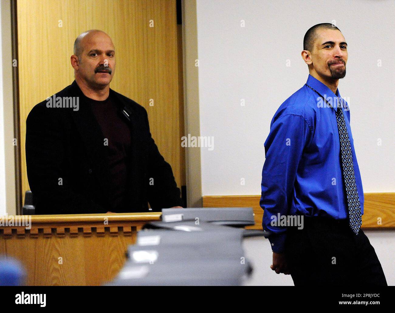 Allen Andrade, right, is escorted into the courtroom during the Angie ...