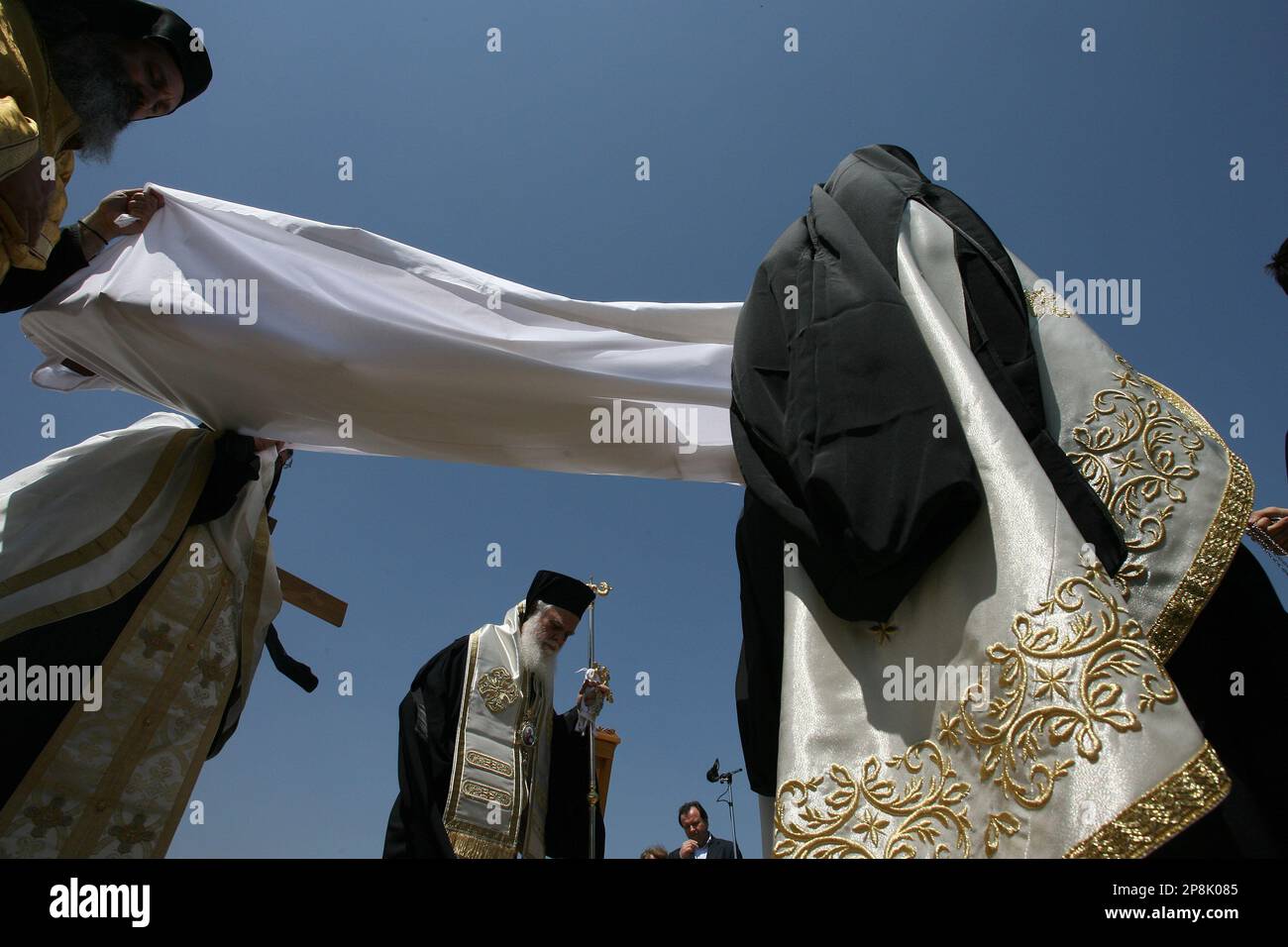 Greek Orthodox priests holds the body of Jesus during a Good Friday ...