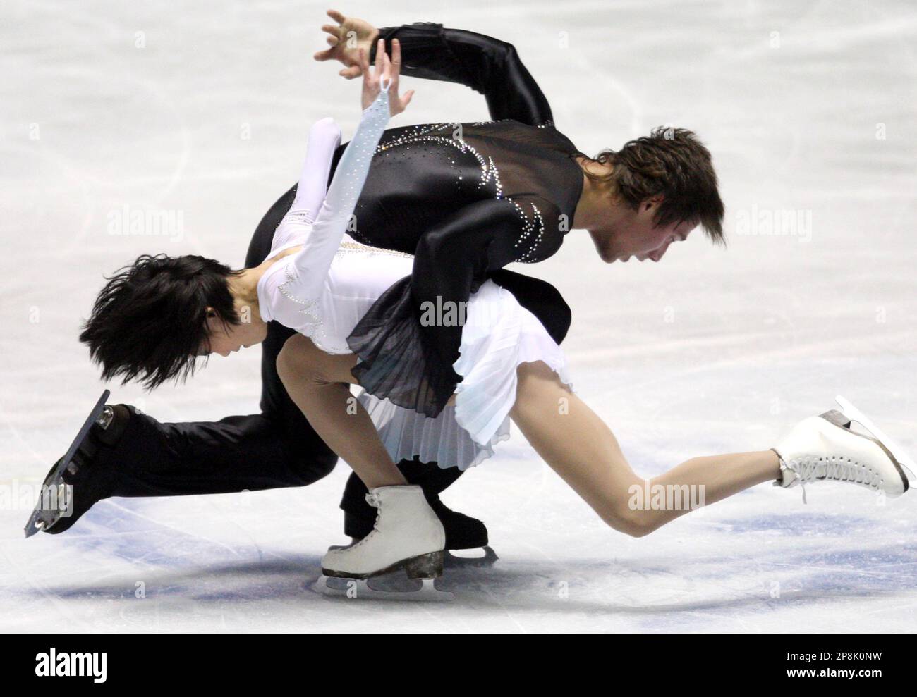 Yuko Kawaguchi and Alexander Smirnov of Russia perform during the pairs ...