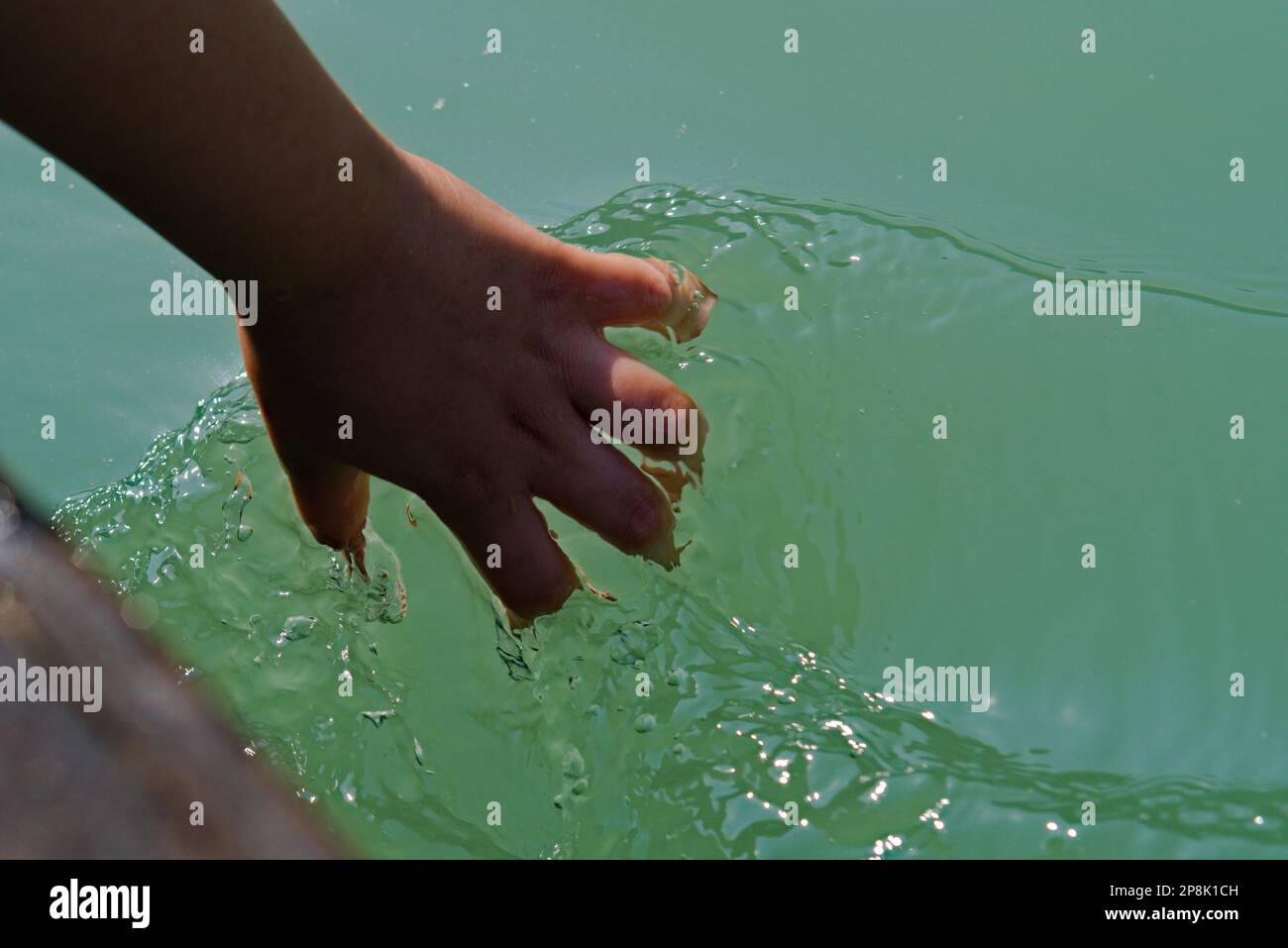 Hand reaching into water hi-res stock photography and images - Alamy