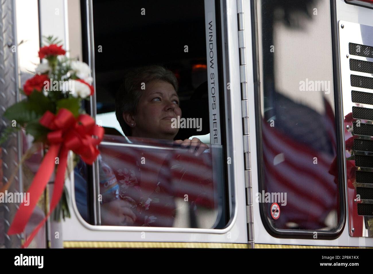 Houston Firefighter Damion Hobbs's mother, Joyce Webb looks out onto ...