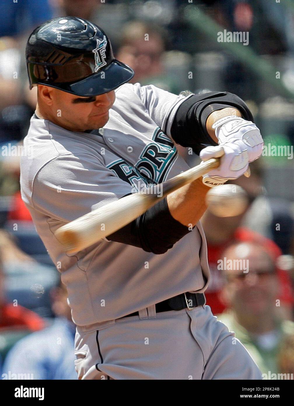 Florida Marlins' Cody Ross connects for a base hit in the seventh ...