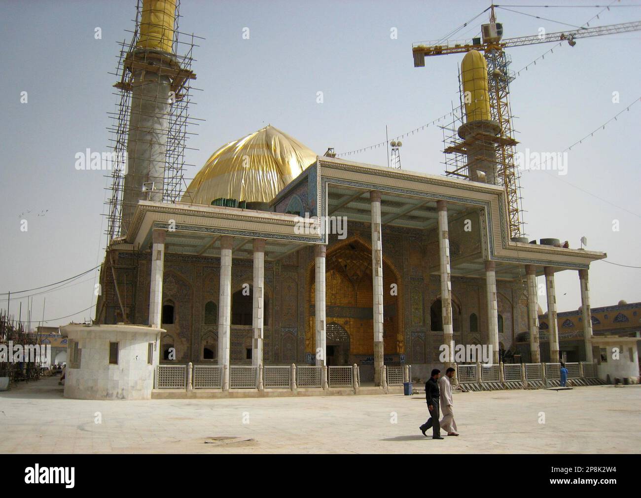 Construction cranes and scaffolding are seen at the newly rebuilt ...