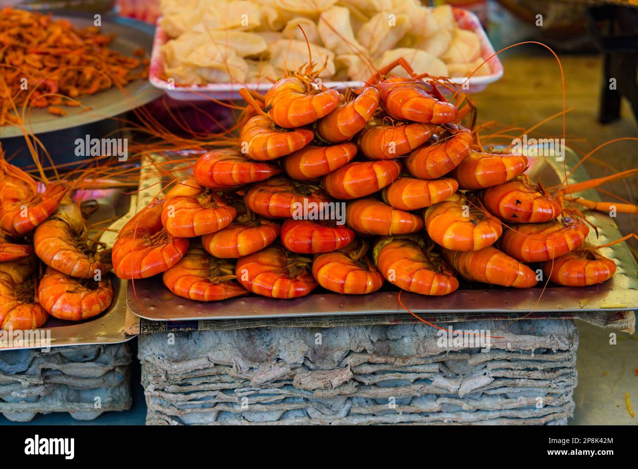 full plate of marinated prawns ready to be cooked in stall Stock Photo ...