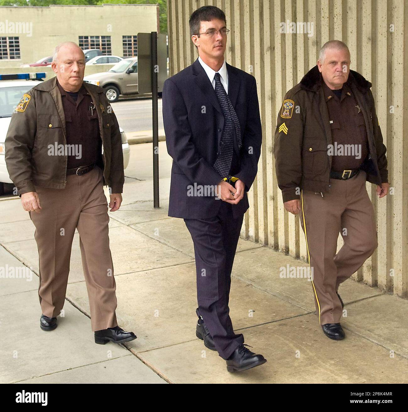 Morgan County Sheriff's Deputies escort Daniel Wade Moore to court ...