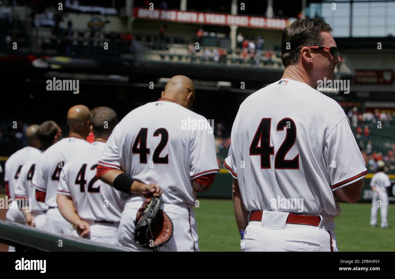 Arizona Diamondbacks team members, including manager Bob Melvin, right ...