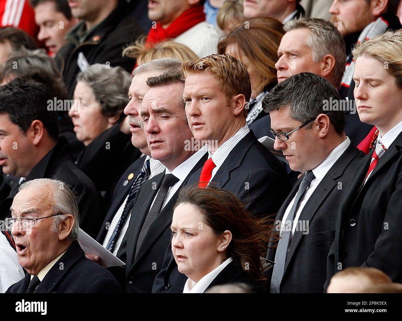 Alex Hicks, center, son of Liverpool co-owner Tom Hicks, takes his seat ...