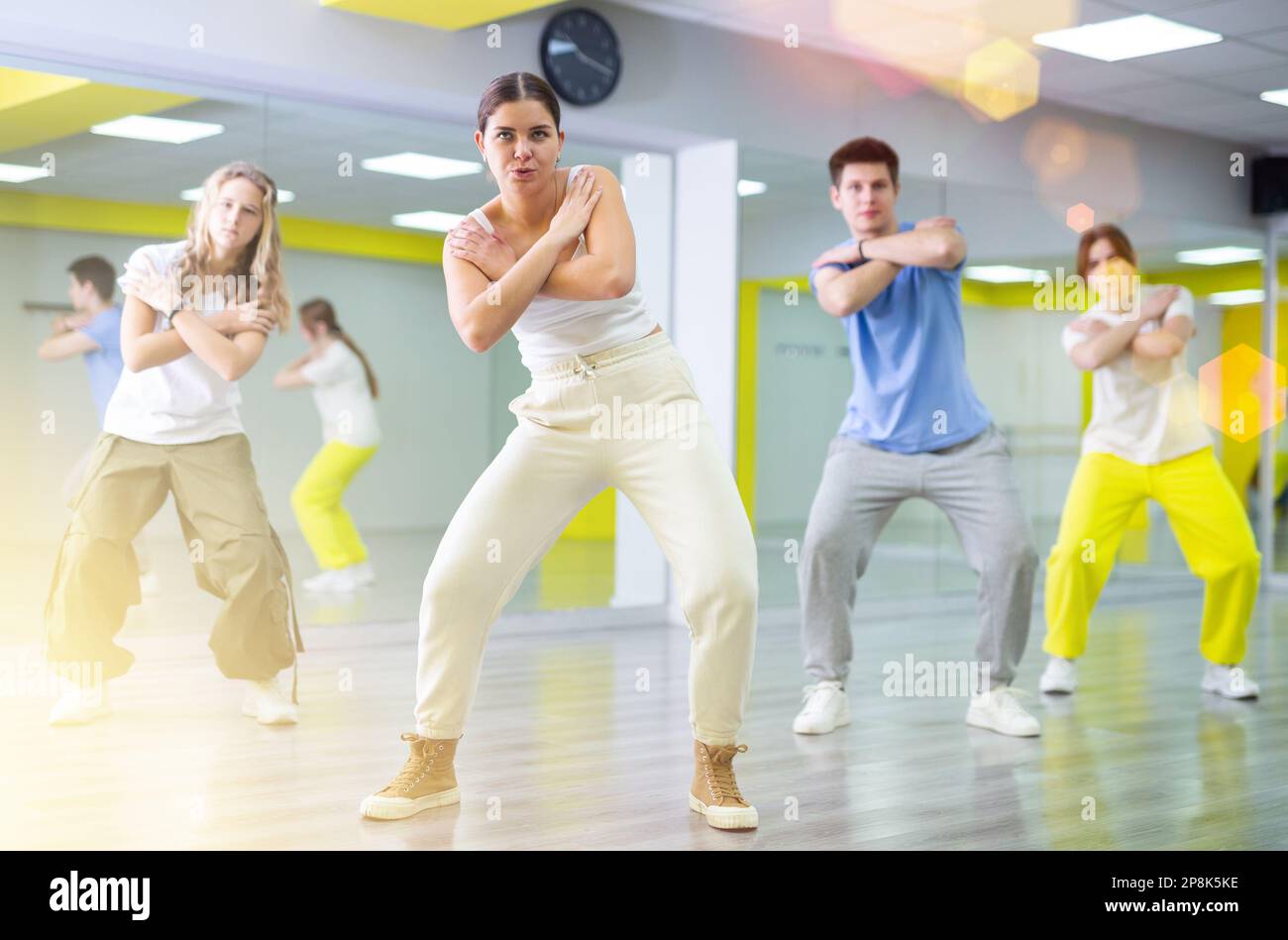 Young girl training breakdance Toprock moves in dance hall Stock Photo ...