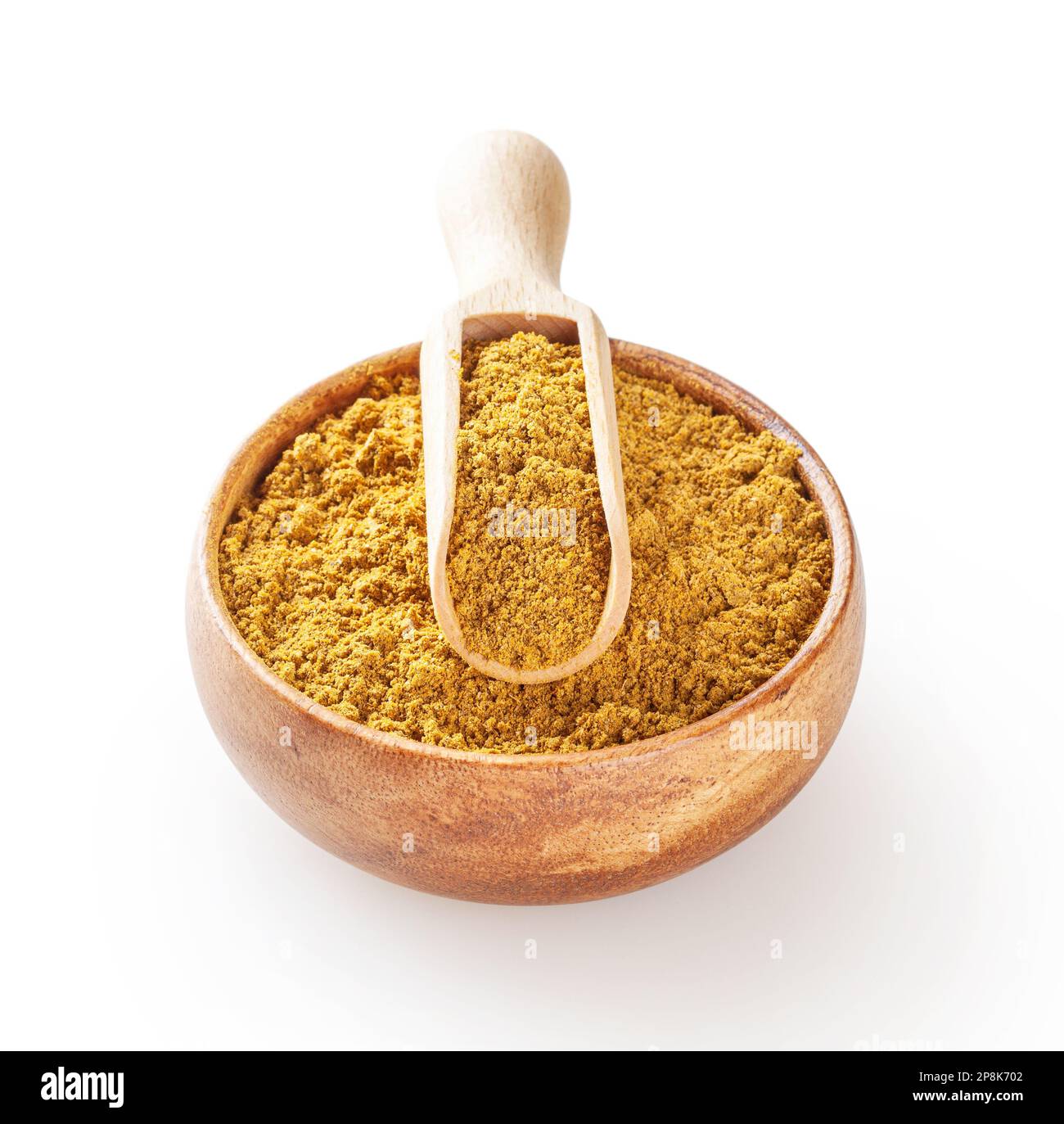 Curry powder in wooden bowl with scoop isolated on white background ...