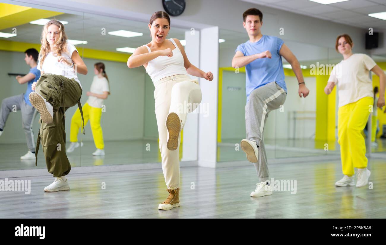 Young girl training breakdance Footwork moves in dance hall Stock Photo ...