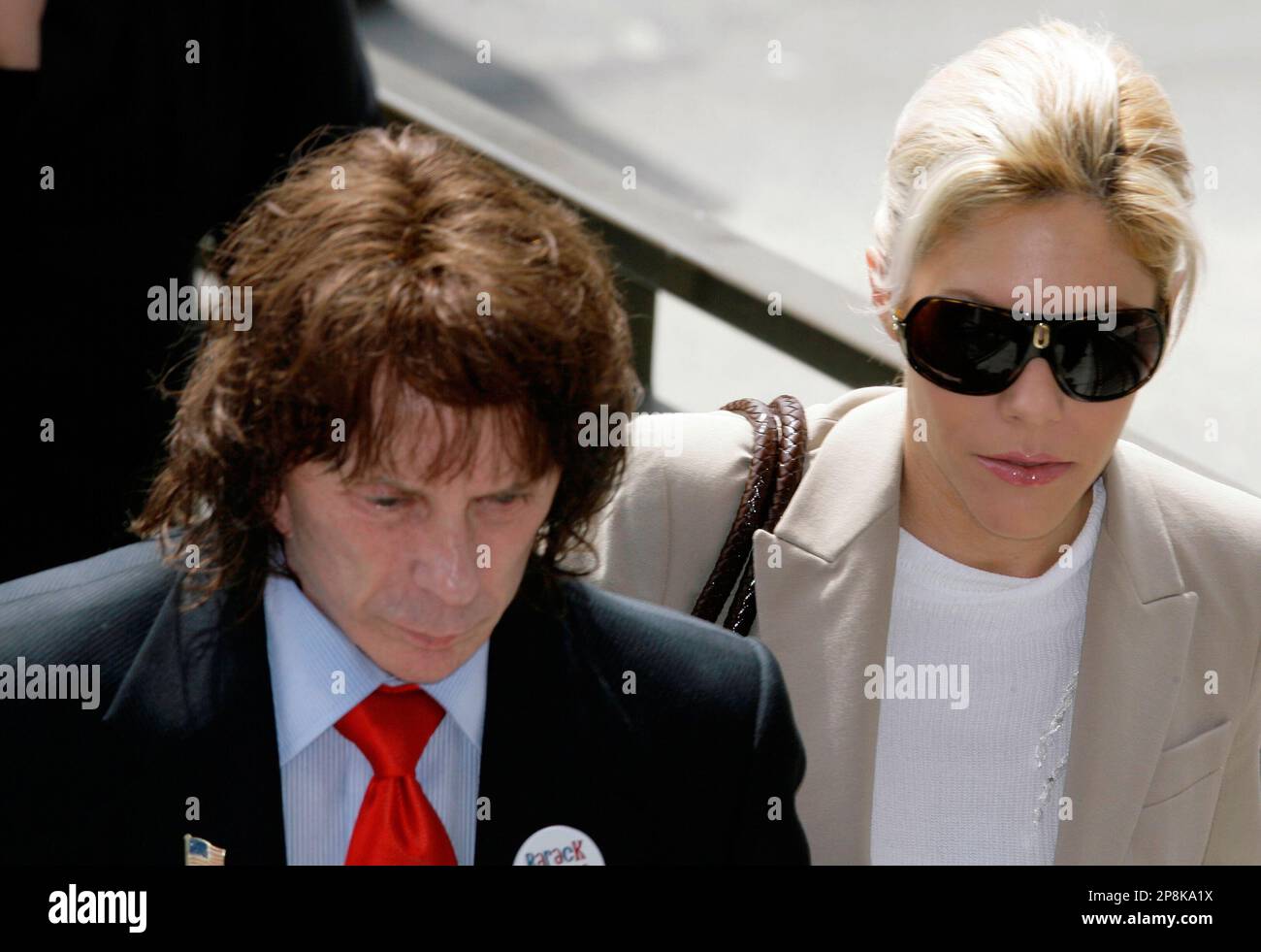 Music producer Phil Spector, left, and his wife Rachelle Spector arrive ...