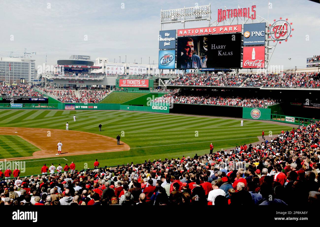 The Washington Nationals stand for a moment of silence for legendary ...