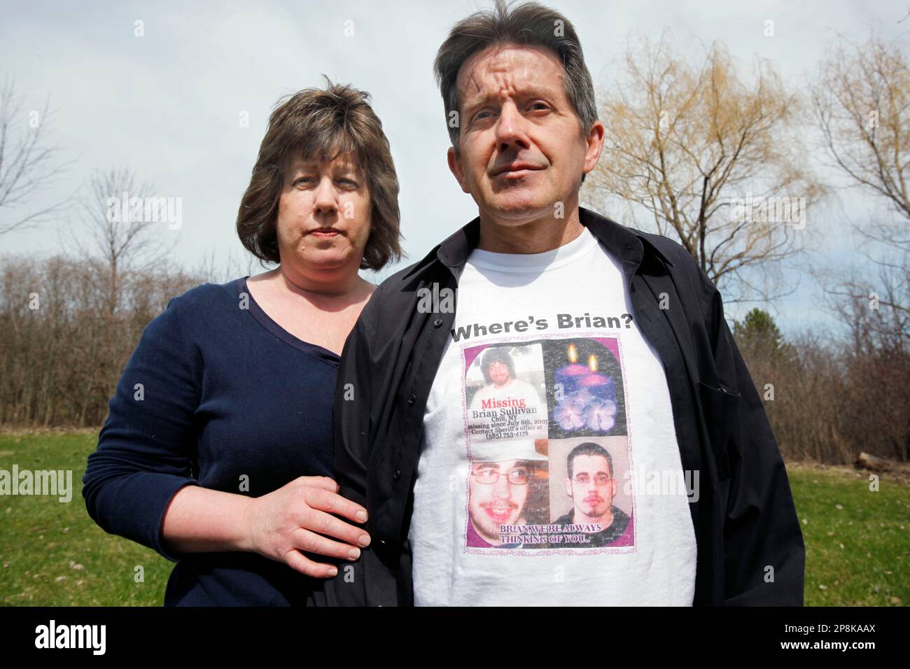 Daniel Sullivan, wearing a missing person shirt showing his son Brian ...