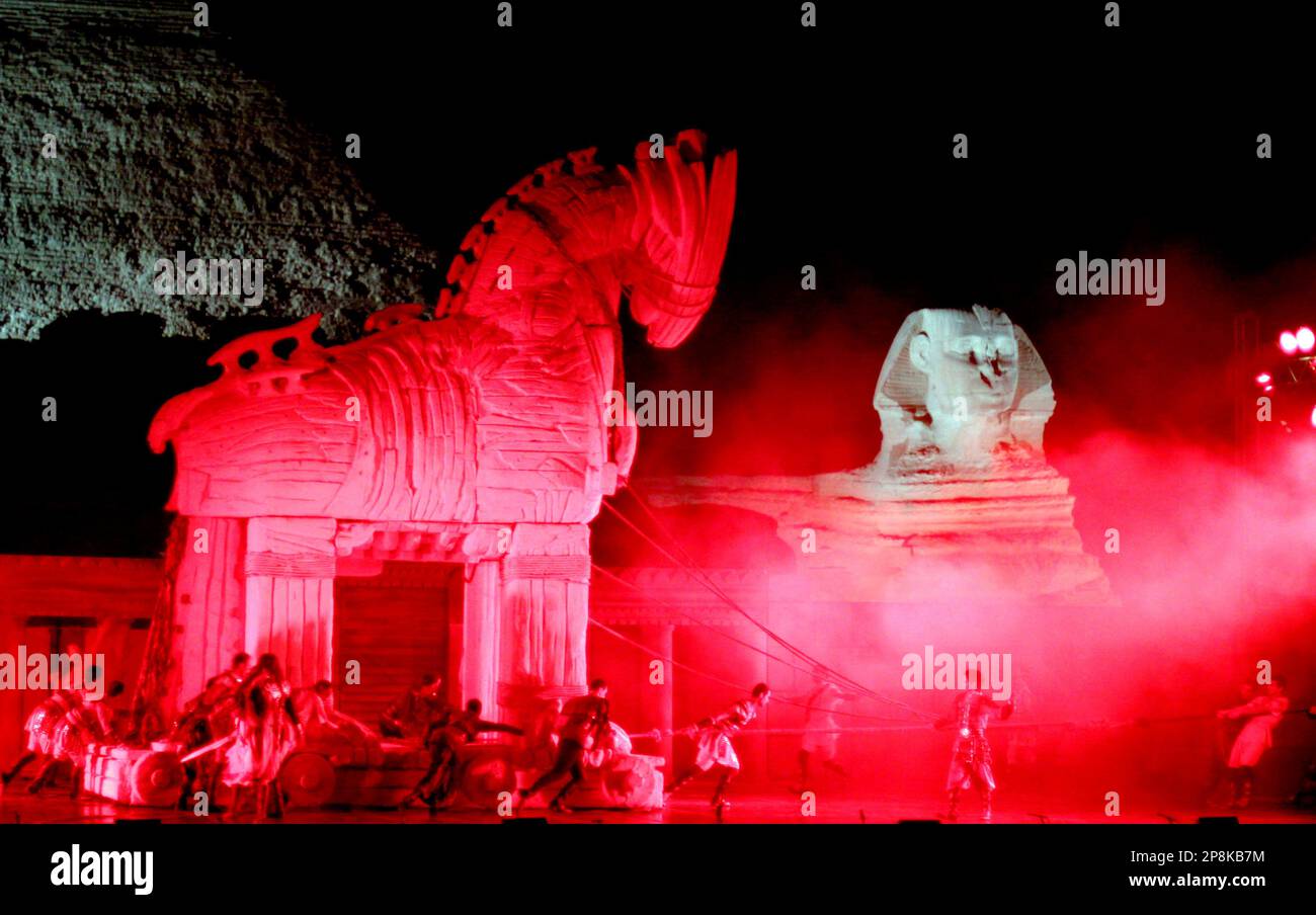 Turkish actors pull a giant Trojan horse at the historical site of the ...
