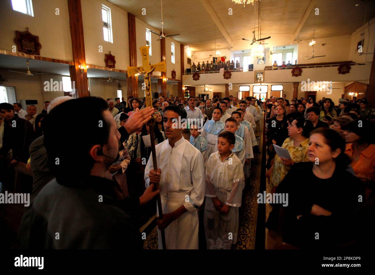 Iraqi Christians attend Easter Mass in a church in Baghdad, Iraq ...