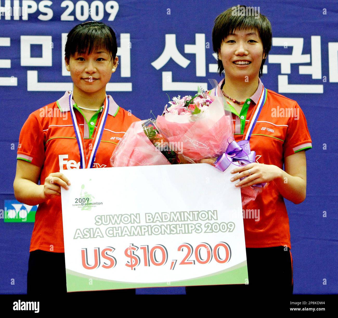 China's Ma Jin, left, and Wang Xiaoli pose after the women's doubles ...