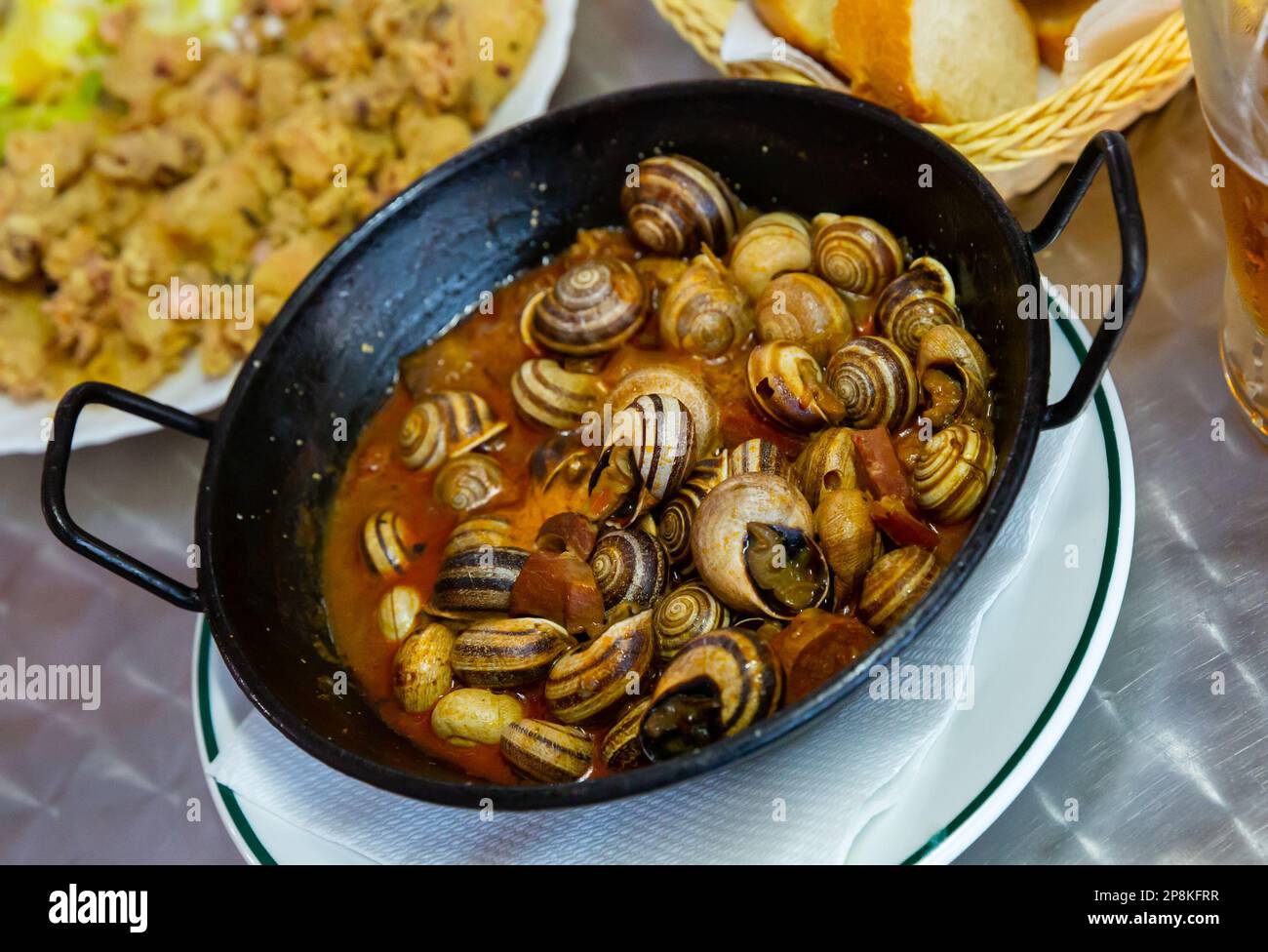Grape snail dish hi-res stock photography and images - Alamy