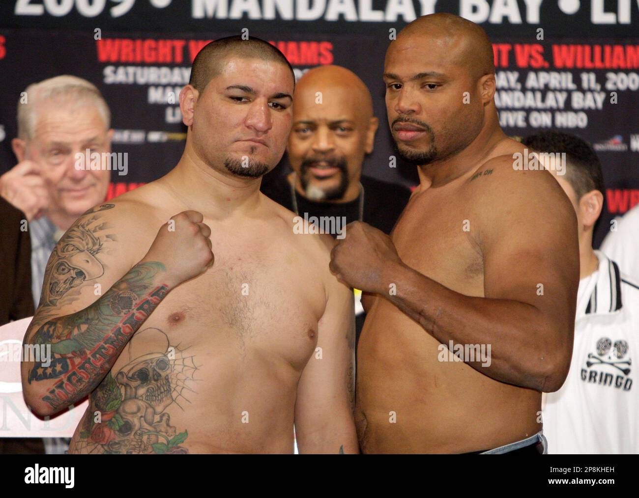 Boxers Chris Arreola, left, and Jameel McCline pose for photos during ...
