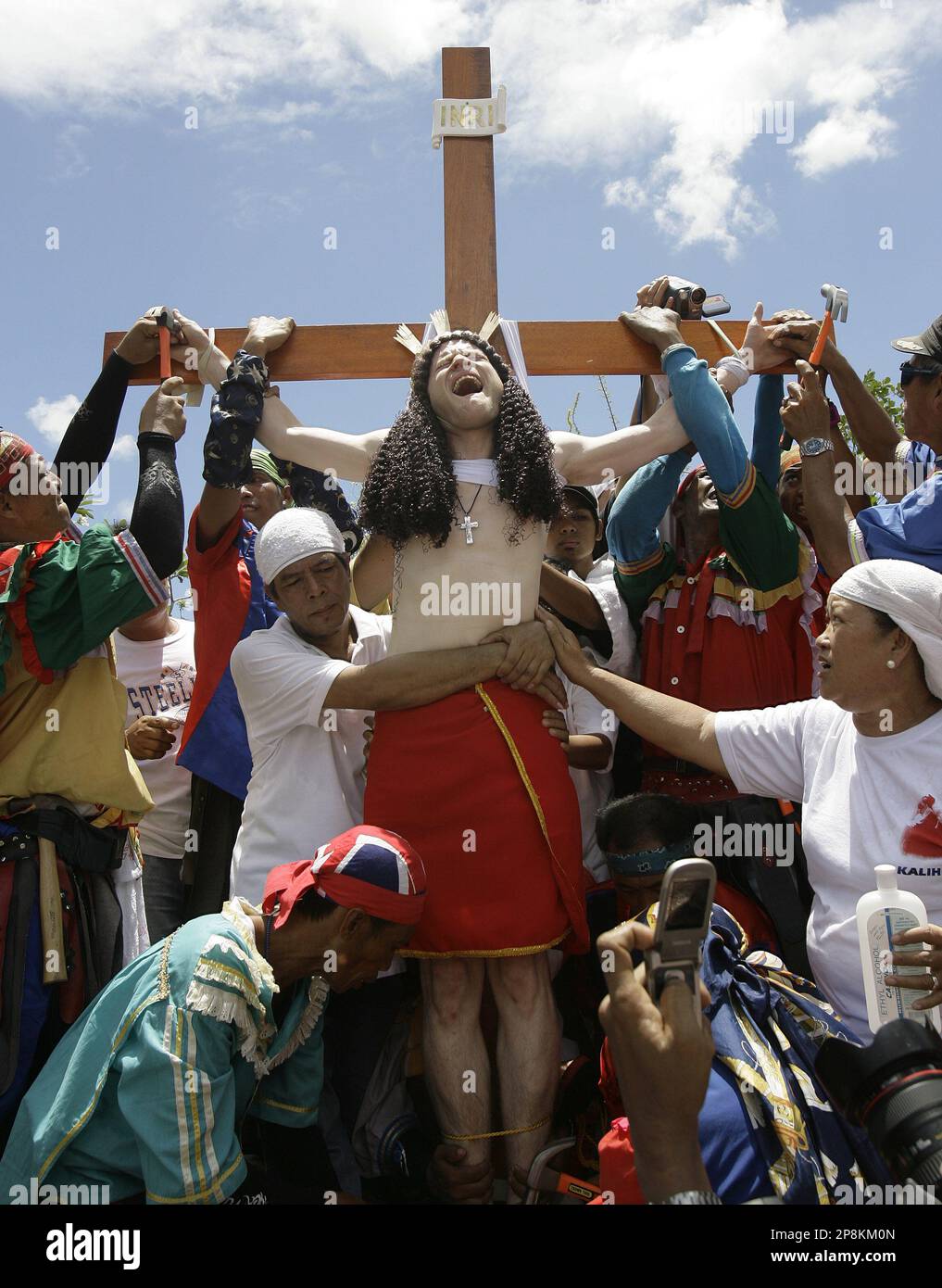 John Michael, a 33-year-old Australian from Melbourne, shouts in pain ...