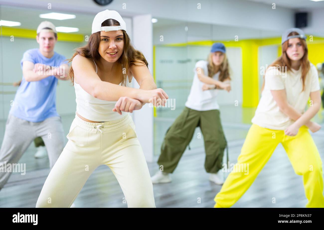 Young girl in cap dancing hip hop Stock Photo - Alamy