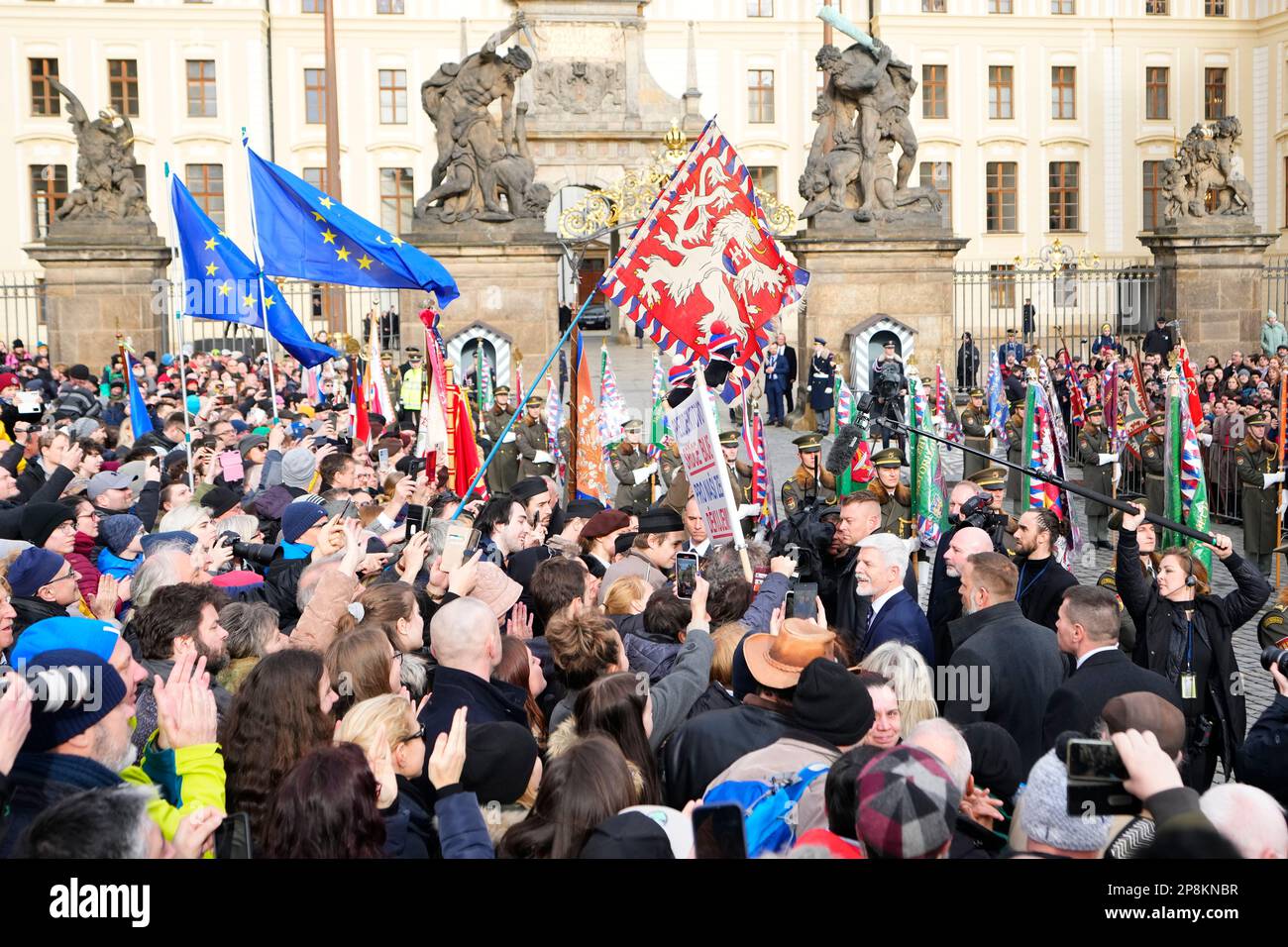Newly elected Czech President Petr Pavel, centre right, is surrounded ...