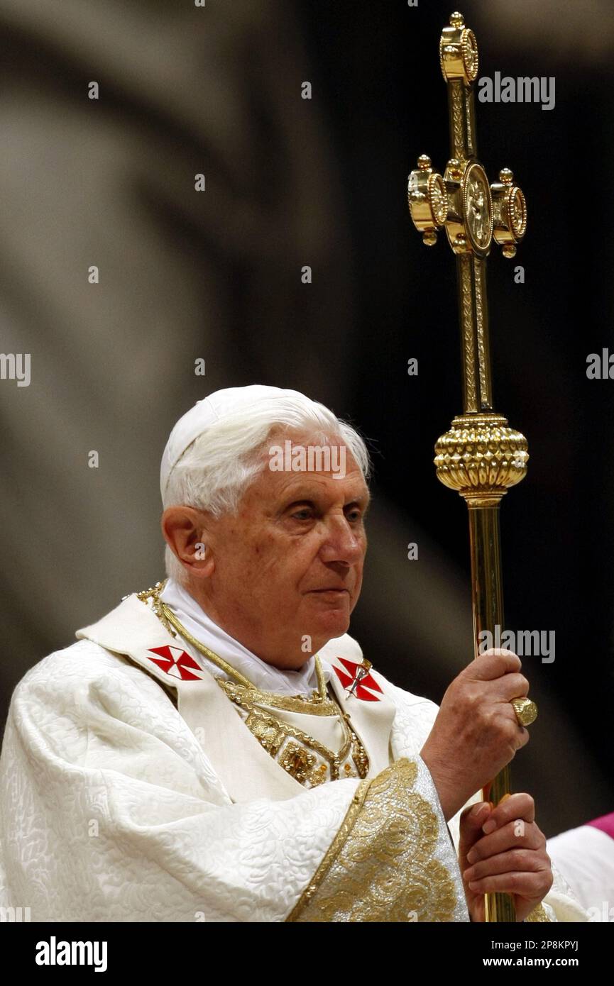 Pope Benedict XVI holds his pastoral staff as he celebrates a Chrism ...
