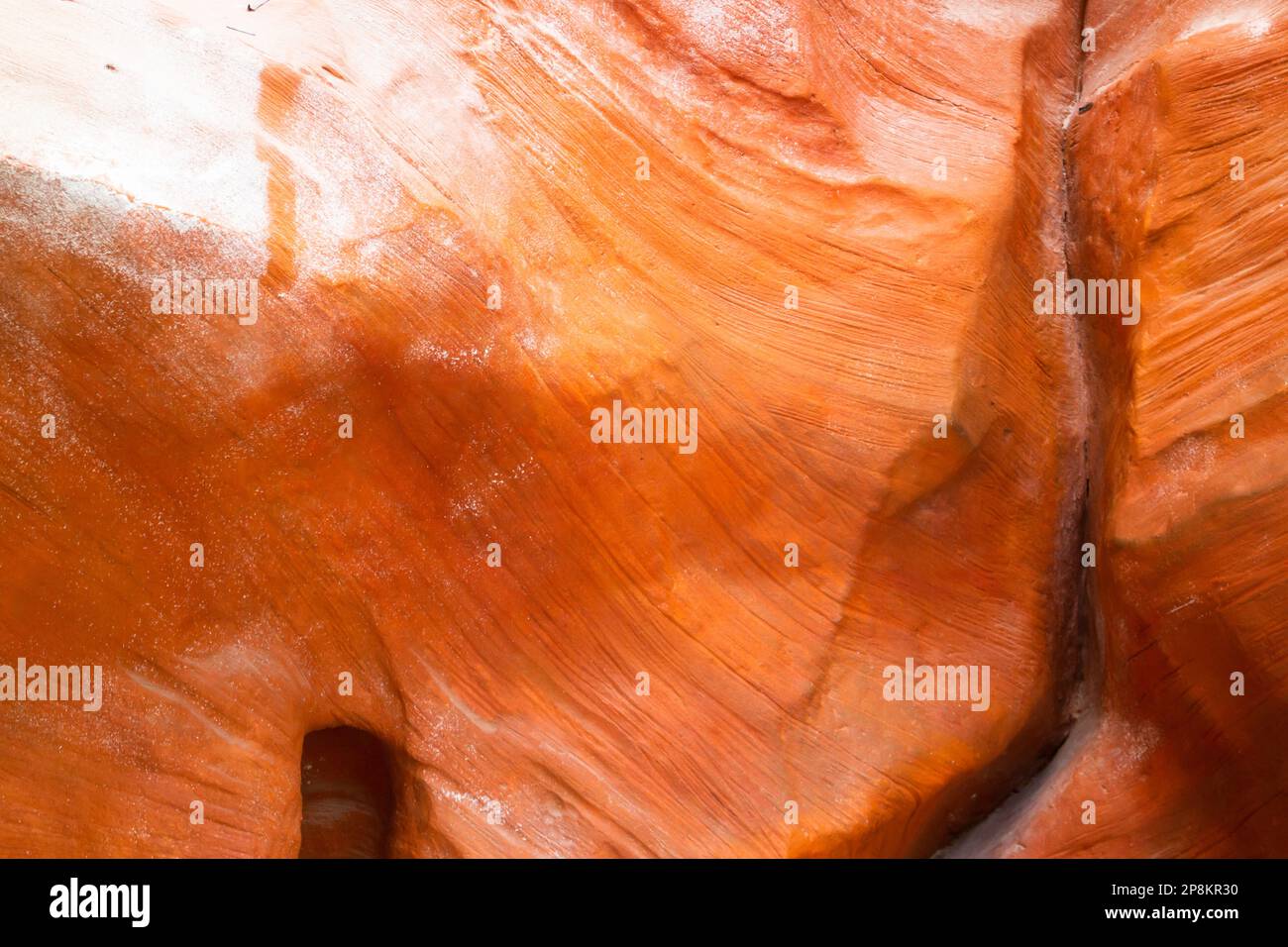 Brown sand-colored stone tiles on the wall, stock photo Stock Photo - Alamy