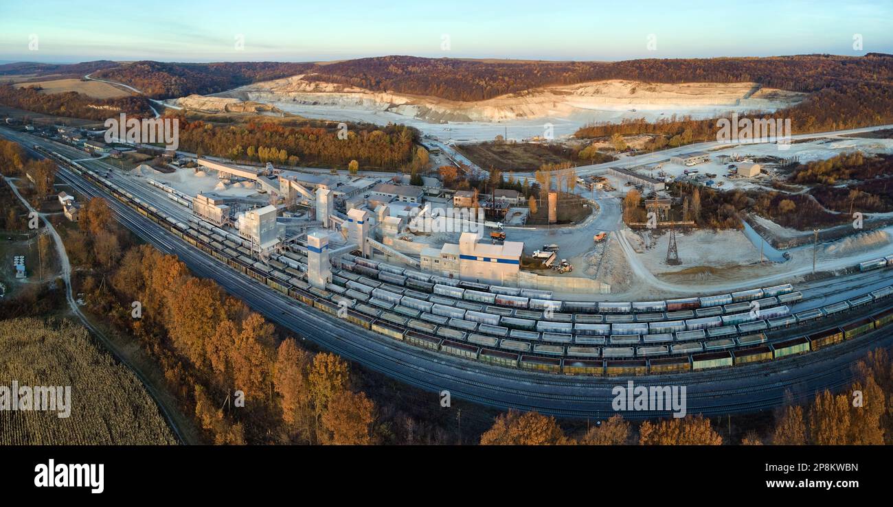 Aerial view of cargo train loaded with crushed sandstone materials at ...