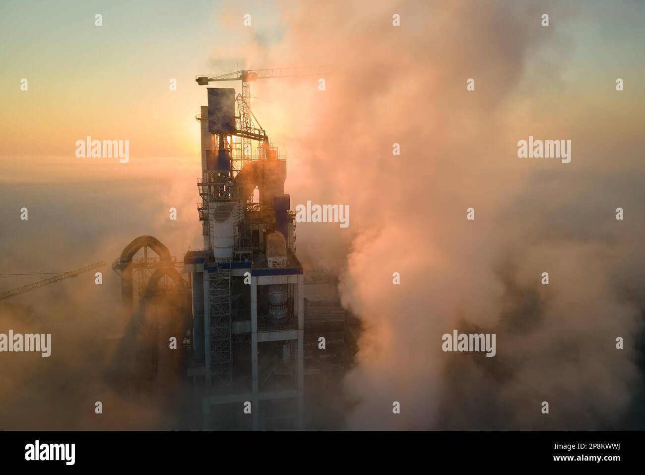 Aerial view of cement factory with high concrete plant structure and ...