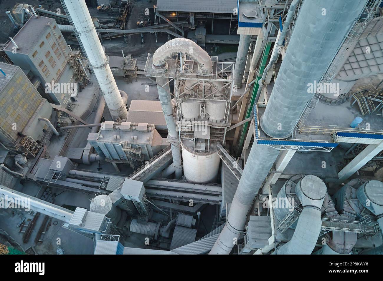Aerial view of cement factory with high concrete plant structure and ...