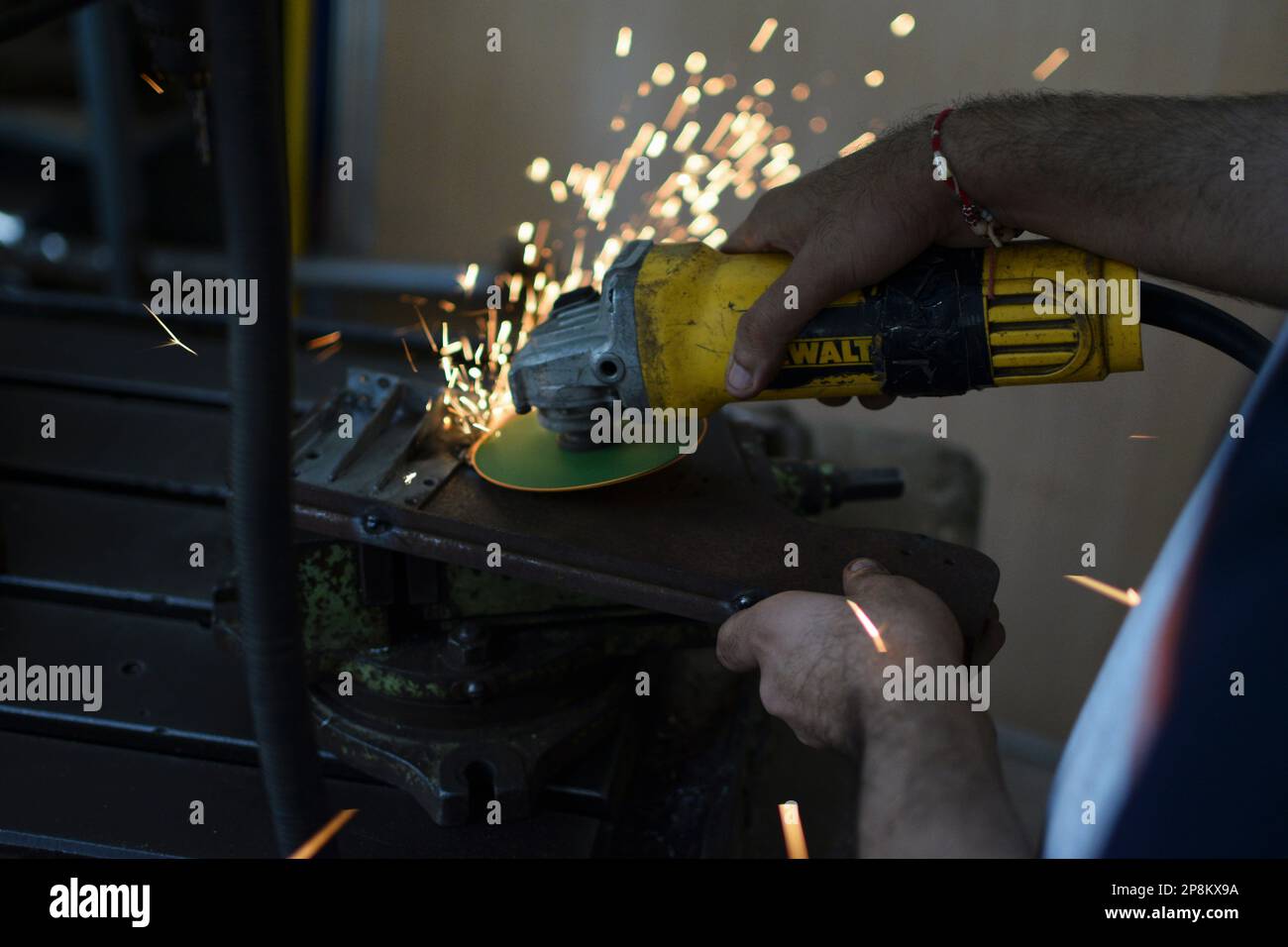 An angle grinder, also known as a side grinder or disc grinder, is a ...