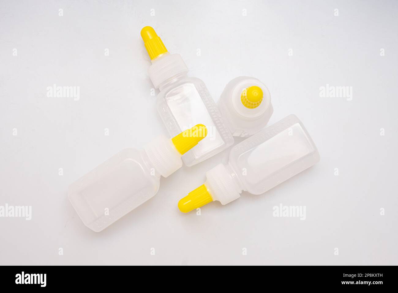 Children's medical potion bottles on a white background Stock Photo - Alamy