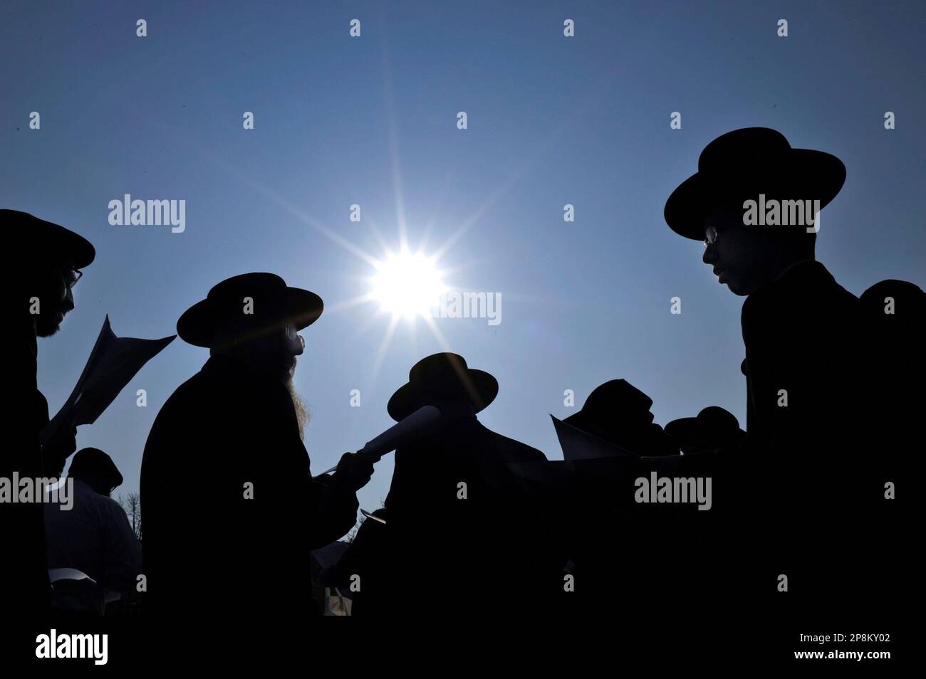 Members of Hungary's Orthodox Jewish community pray during the rare ...