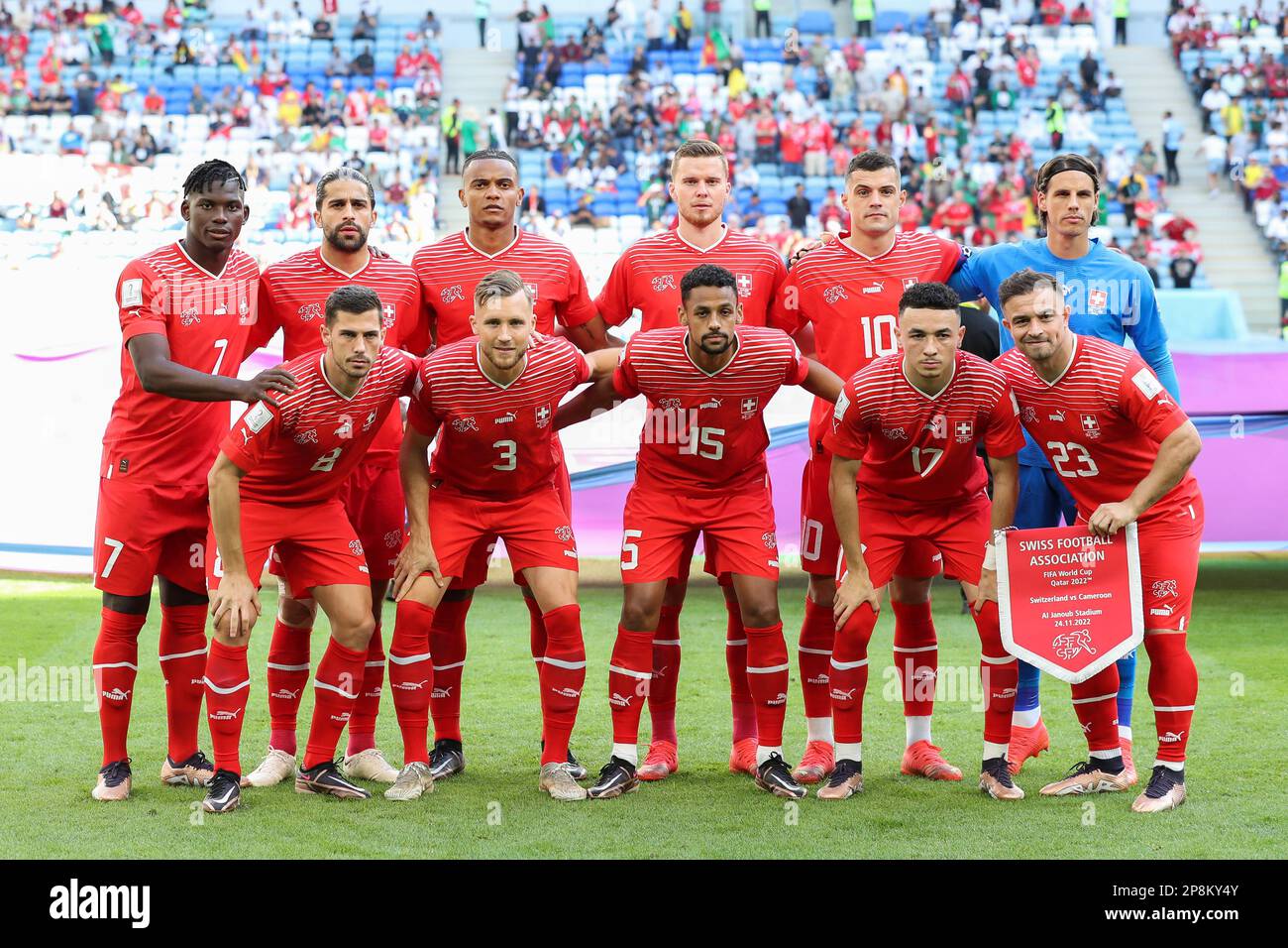 Team Switzerland pose for a group photo during the FIFA World Cup Qatar ...
