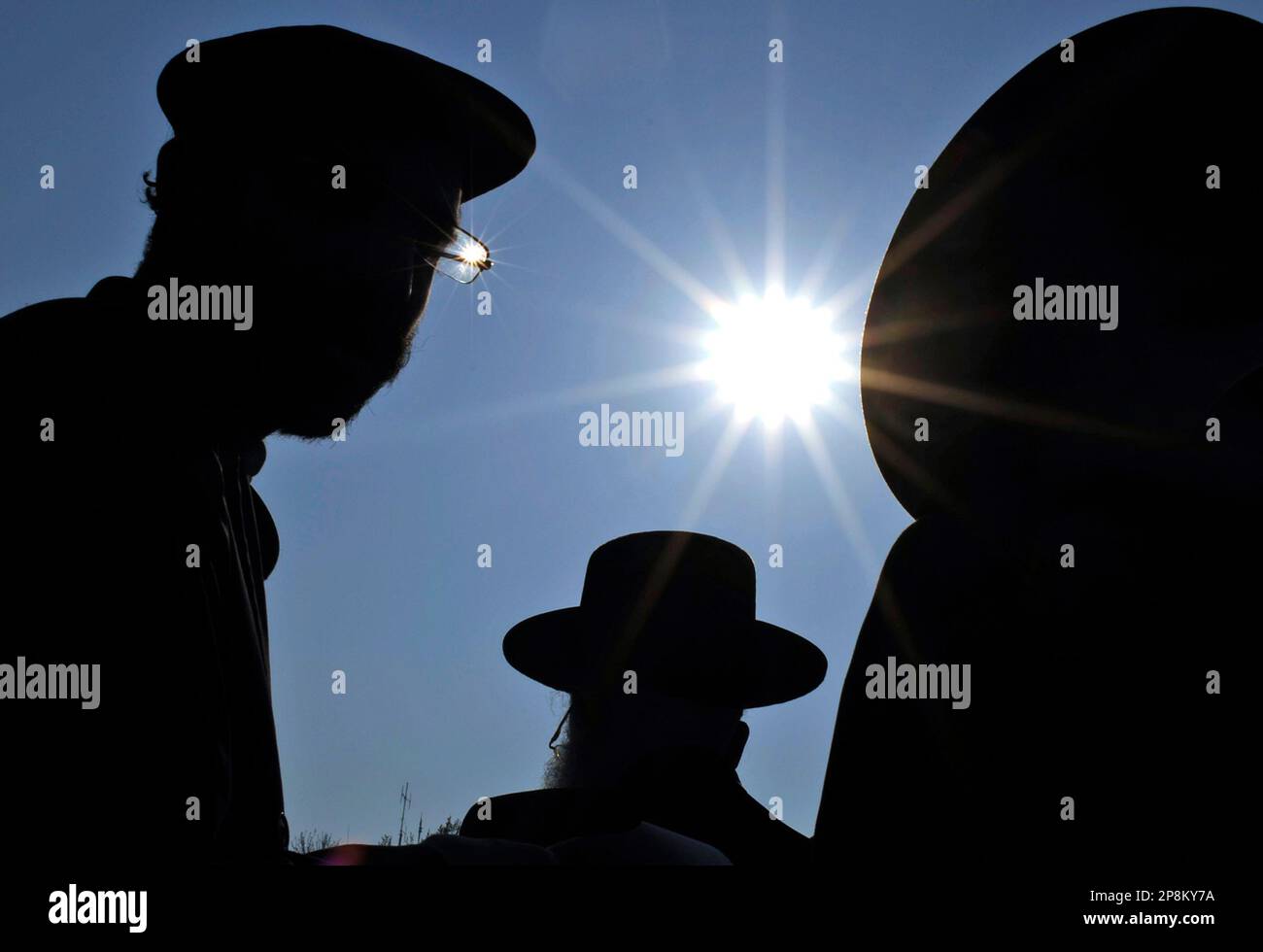 Members of Hungary's Orthodox Jewish community pray during the rare ...