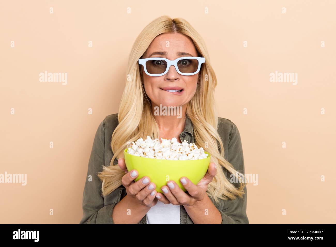 Photo of anxious embarrassed lady wear trendy clothes hold popcorn ...