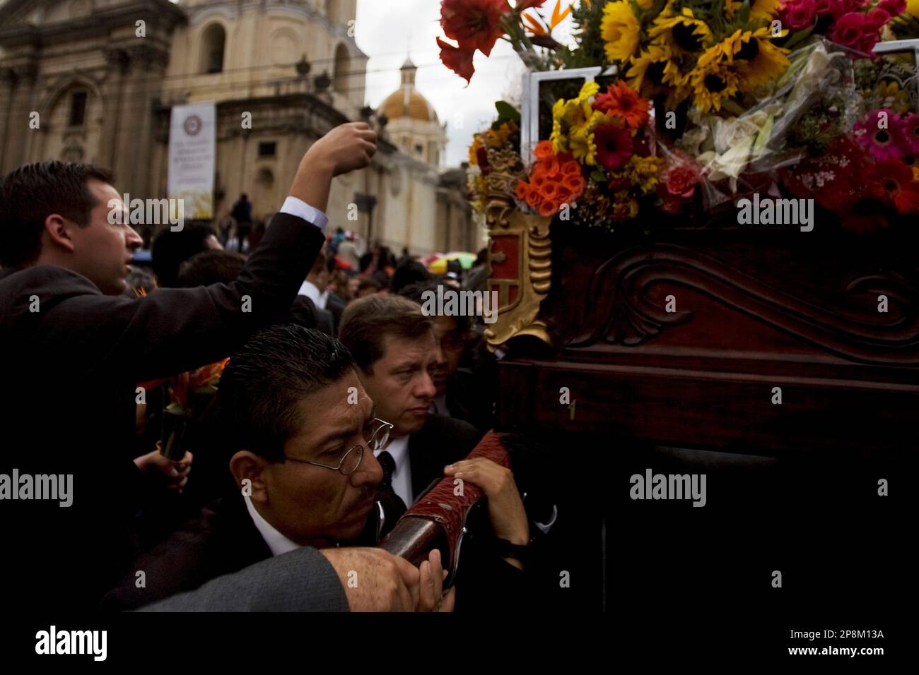 Catholics of La Merced church carry an image of Jesus Christ, unseen ...