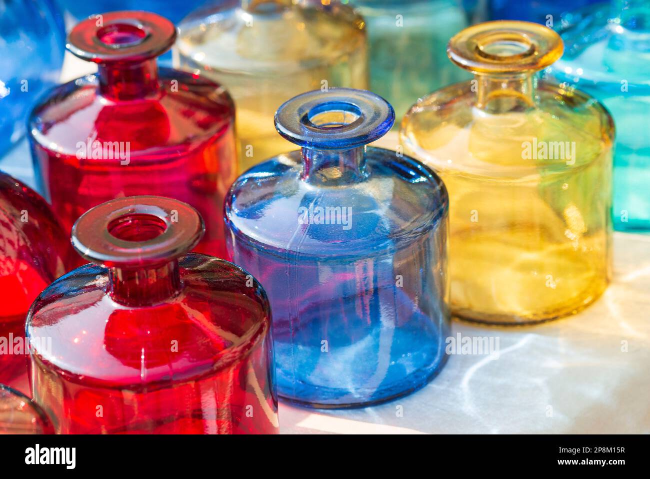 Row colorful glass jars hi-res stock photography and images - Alamy