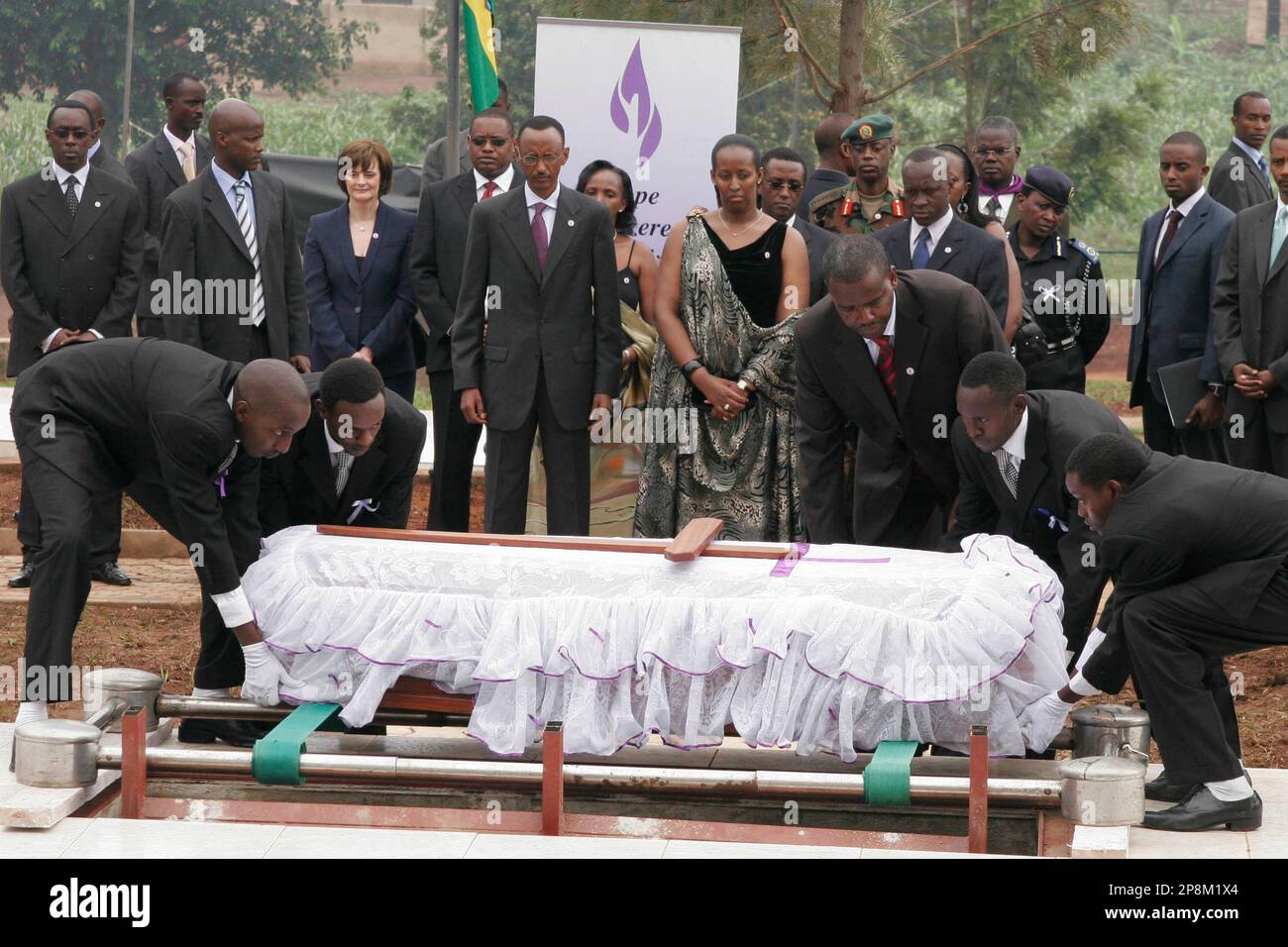 President Paul Kagame and first lady Jeanette Kagame, centre, look on ...