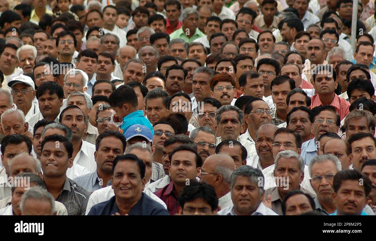 Jain devotees look on during the celebration of Mahavir Jayanti in ...